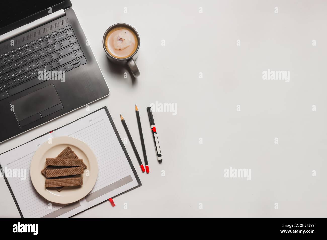 flat lay, books, stationery, coffee and gadgets Stock Photo - Alamy