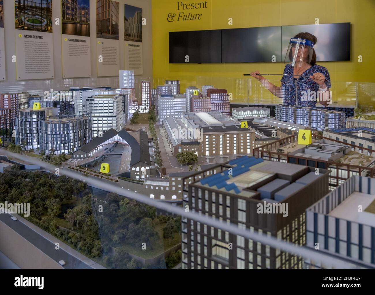 Tour guide explains the model of King’s Cross Past, Present and Future ...