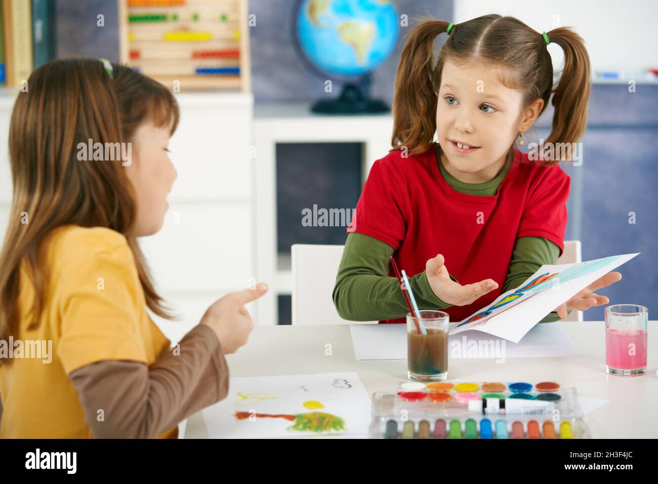Children painting in art class at elementary school Stock Photo - Alamy