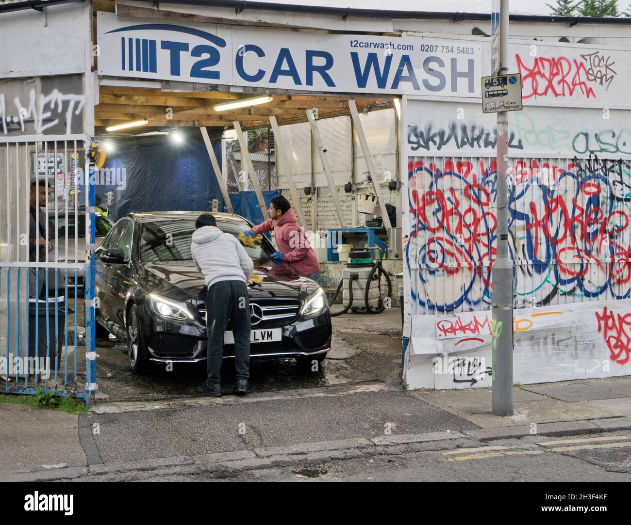 Car wash workers near Brick Lane,London,England,UK Stock Photo - Alamy
