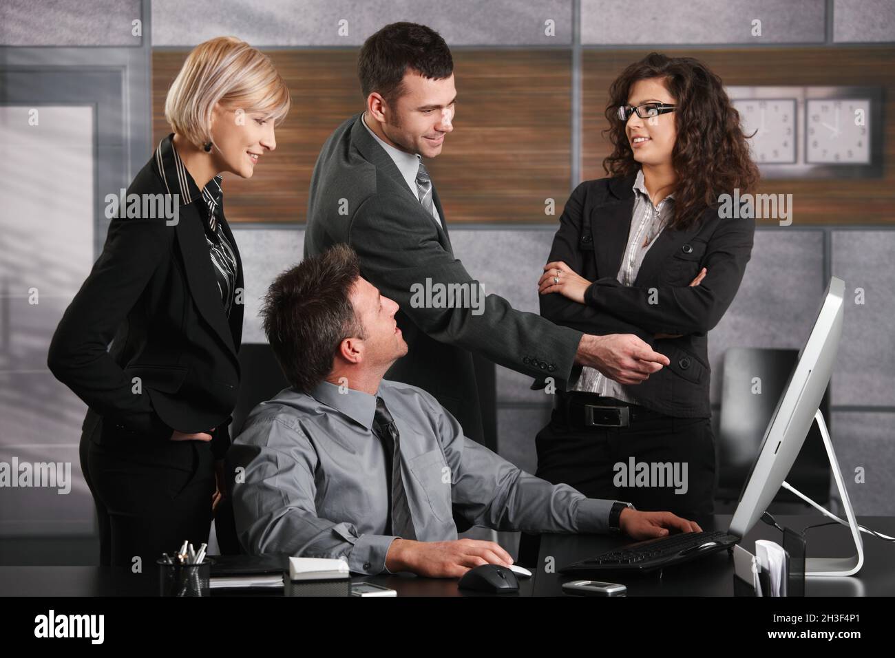 Colleagues work office dark screen hi-res stock photography and images ...