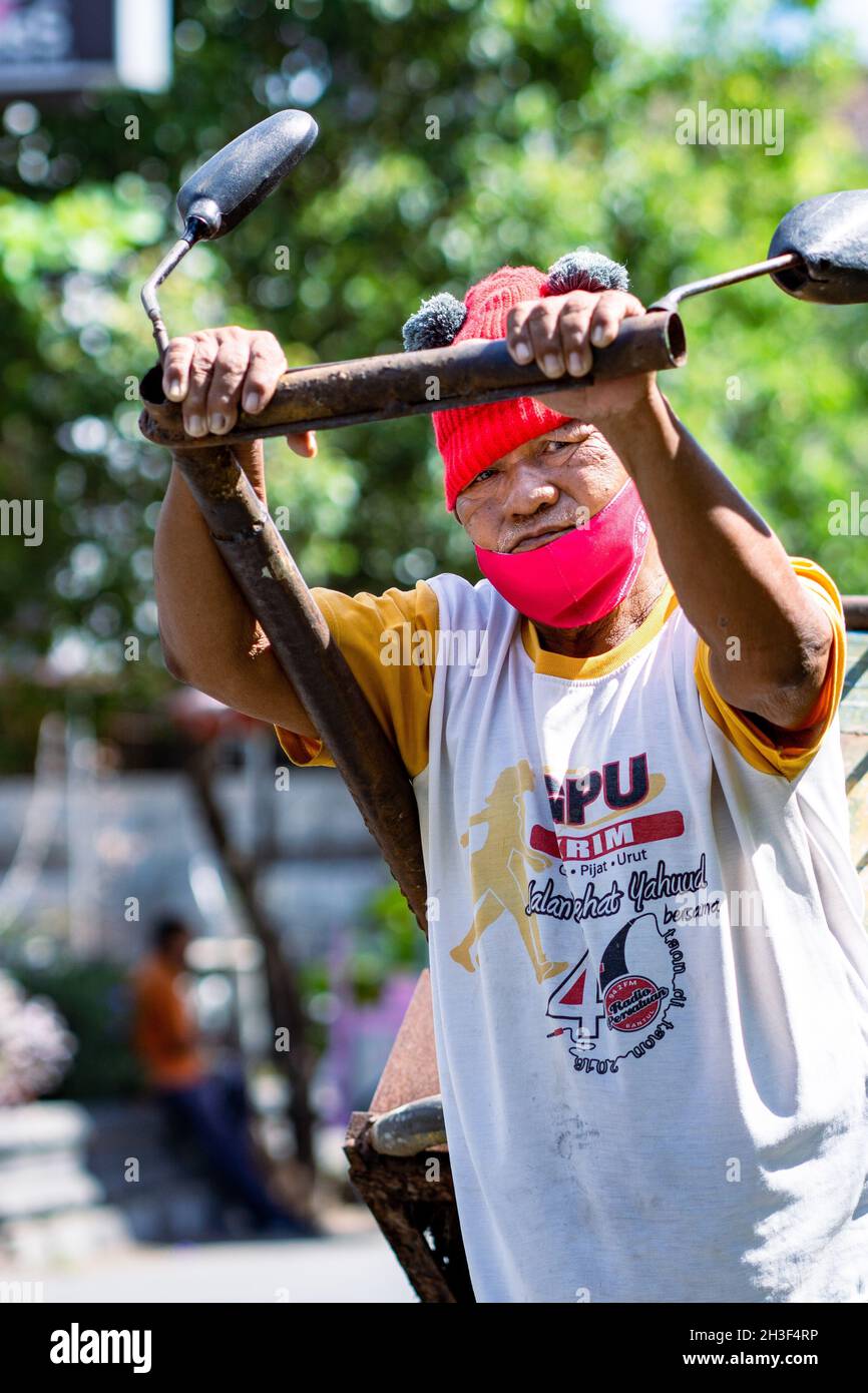YOGYAKARTA, INDONESIA - Jun 29, 2021: An authentic old homeless male ...