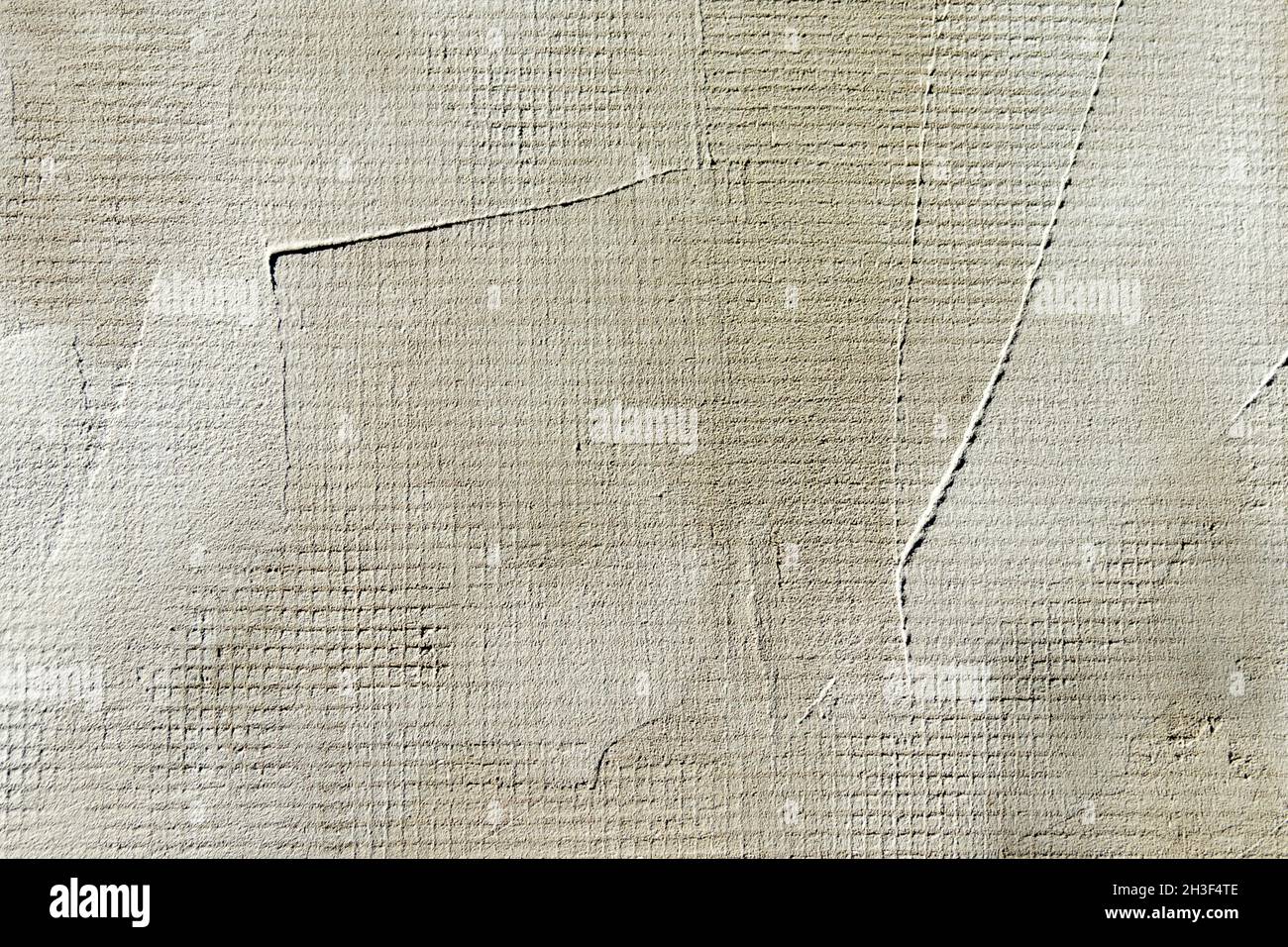 Plaster texture. Textured whitewash wall close-up with brush strokes ...