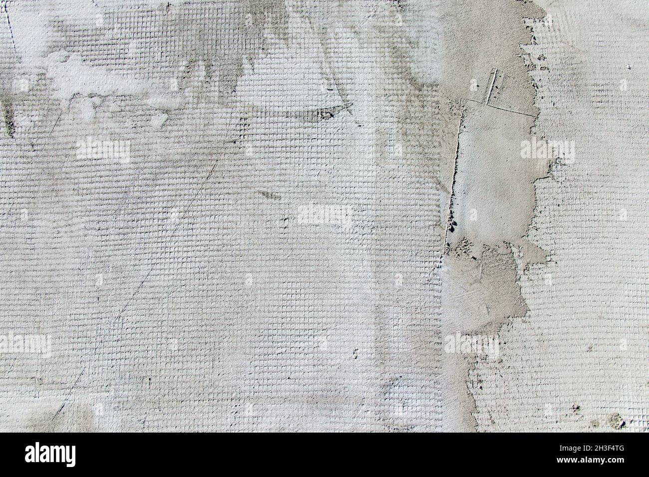Plaster texture. Textured whitewash wall close-up with brush strokes ...
