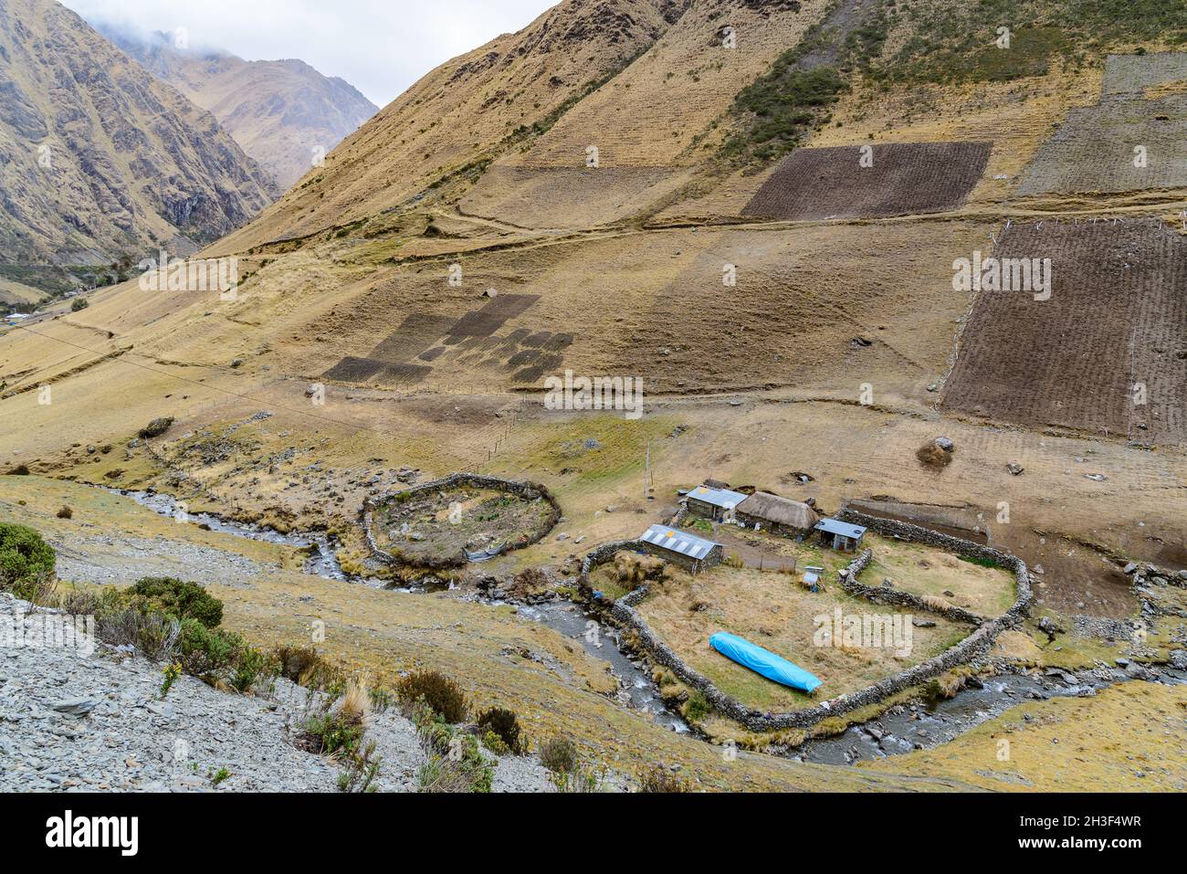 Stone walls around a farm house in the high Andes mountains. Cuzco ...