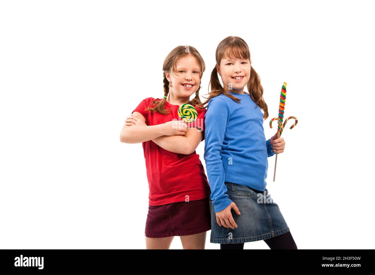 Girls in lollipop pose Stock Photo - Alamy