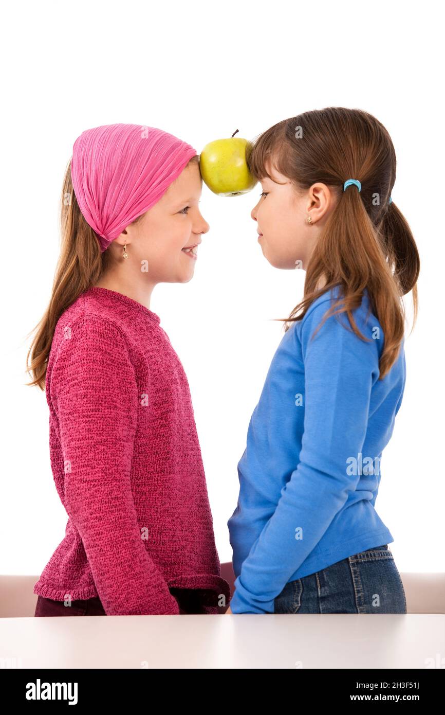 Girls with two apple Stock Photo - Alamy
