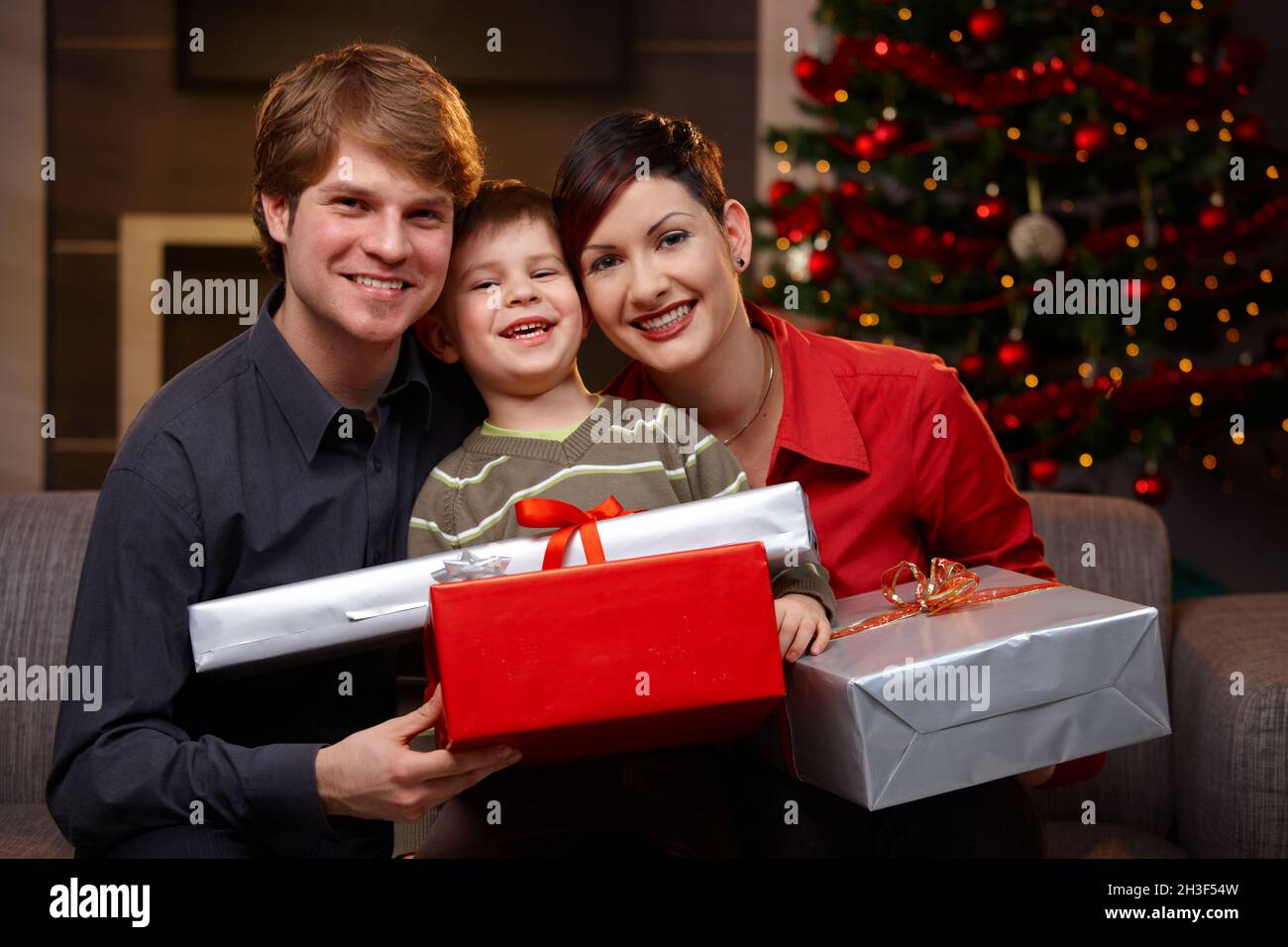 Happy family at christmas Stock Photo - Alamy