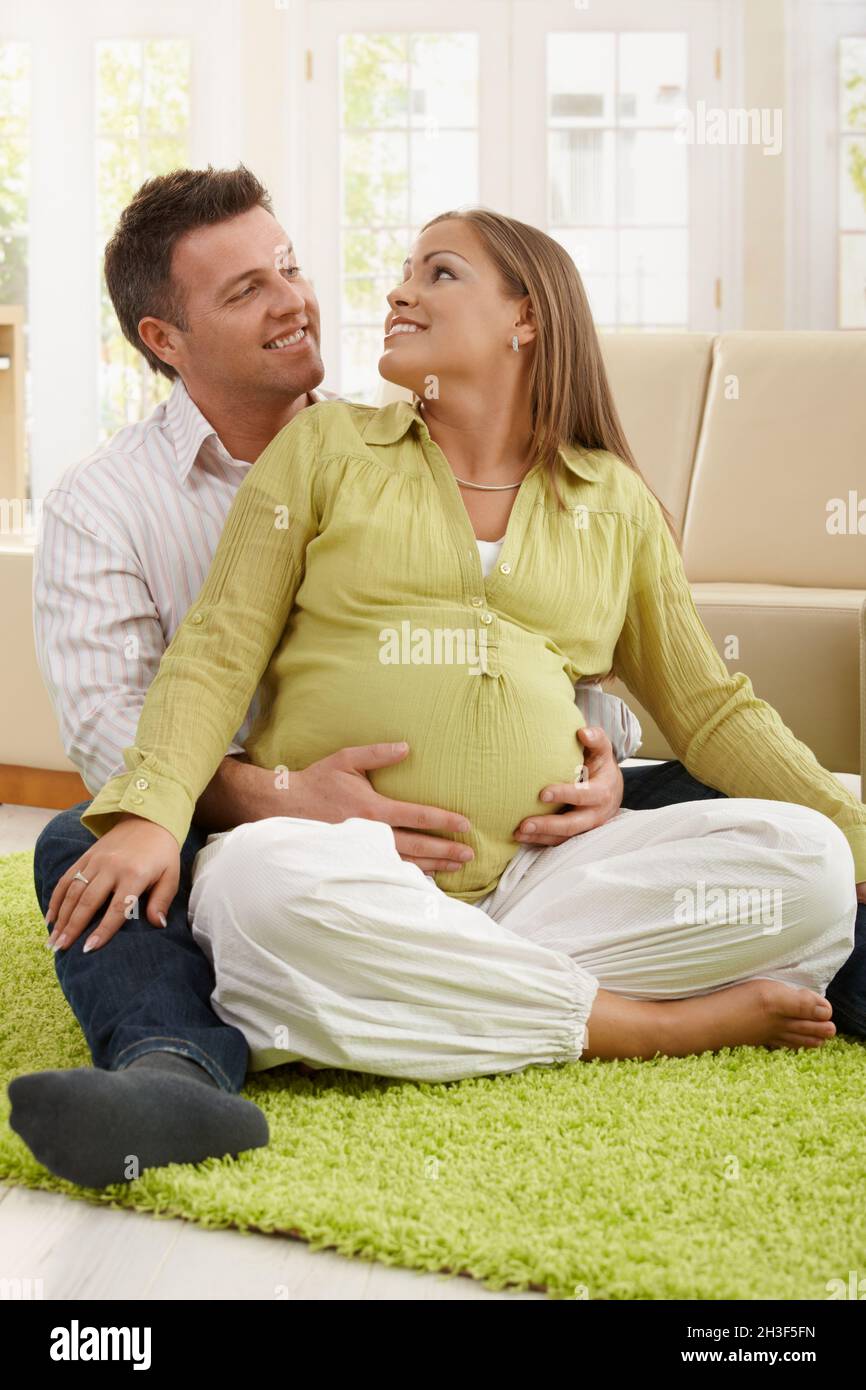 Happy parents expecting baby Stock Photo - Alamy