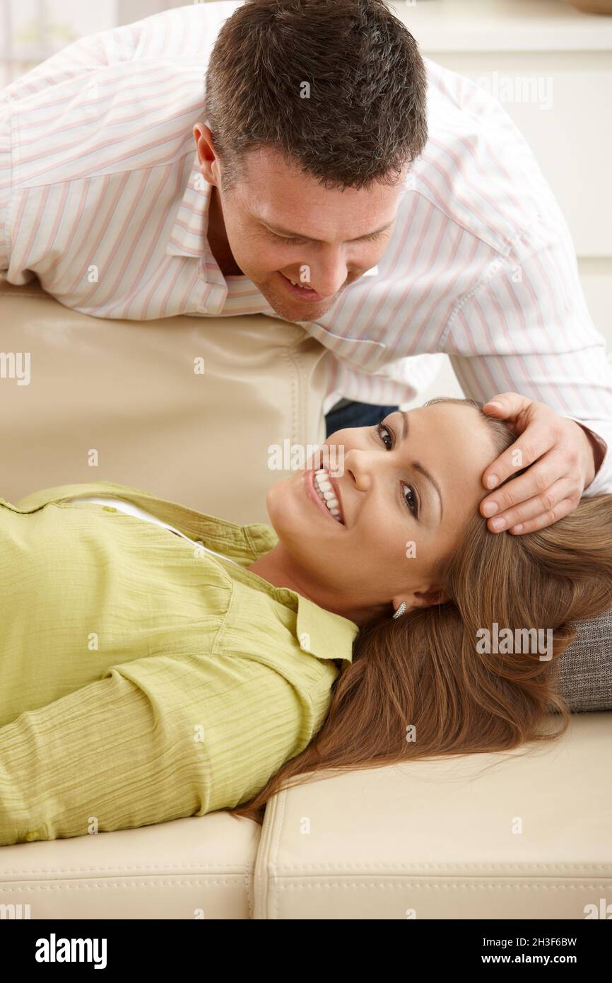 Loving couple lie down hi-res stock photography and images - Alamy