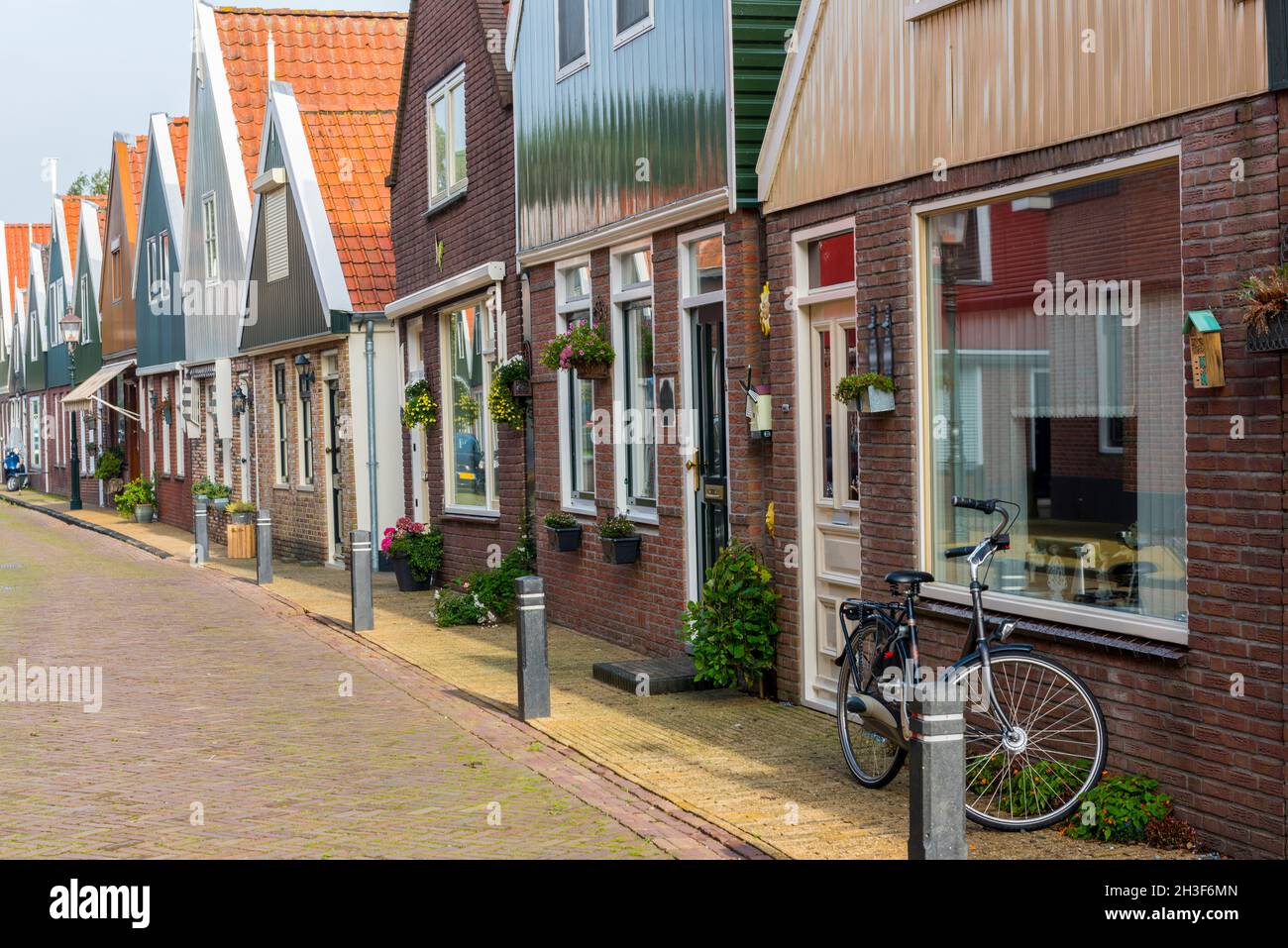 Volendam is a town in North Holland in the Netherlands. Colored houses ...