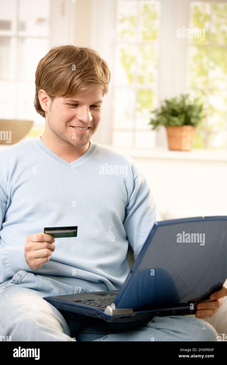 Man shopping online Stock Photo - Alamy