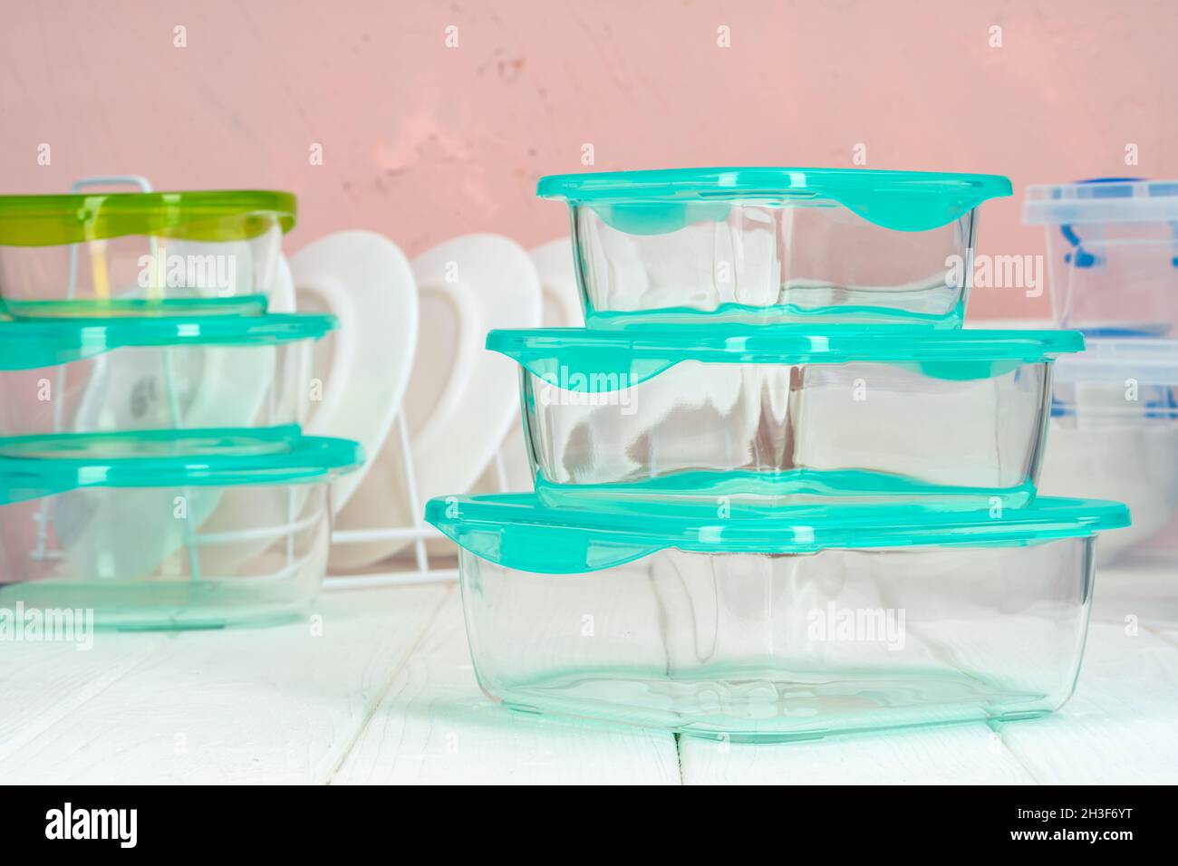 Clean kitchen with various plates and food boxes Stock Photo - Alamy