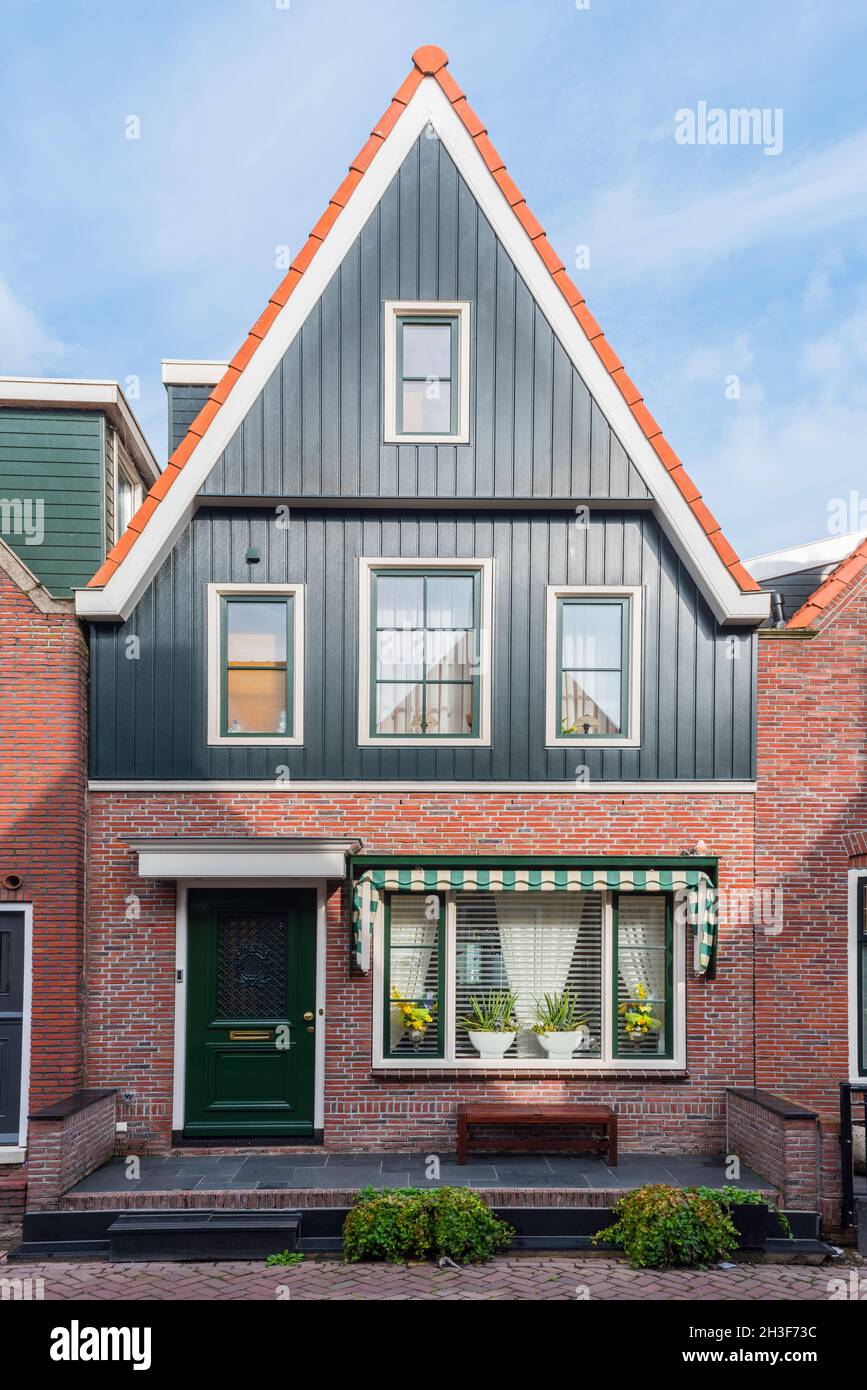 Volendam is a town in North Holland in the Netherlands. Colored houses ...