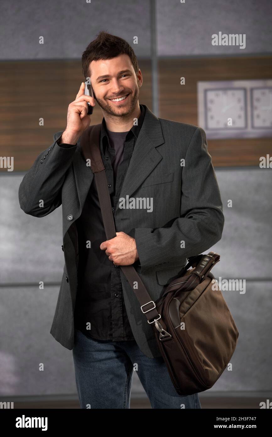 Happy office worker Stock Photo - Alamy