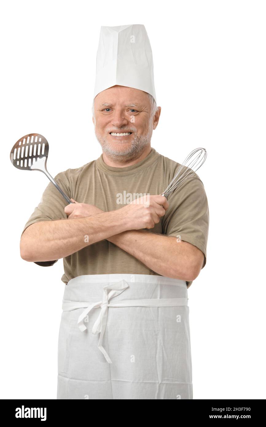 Senior cook with kitchen utensils Stock Photo - Alamy