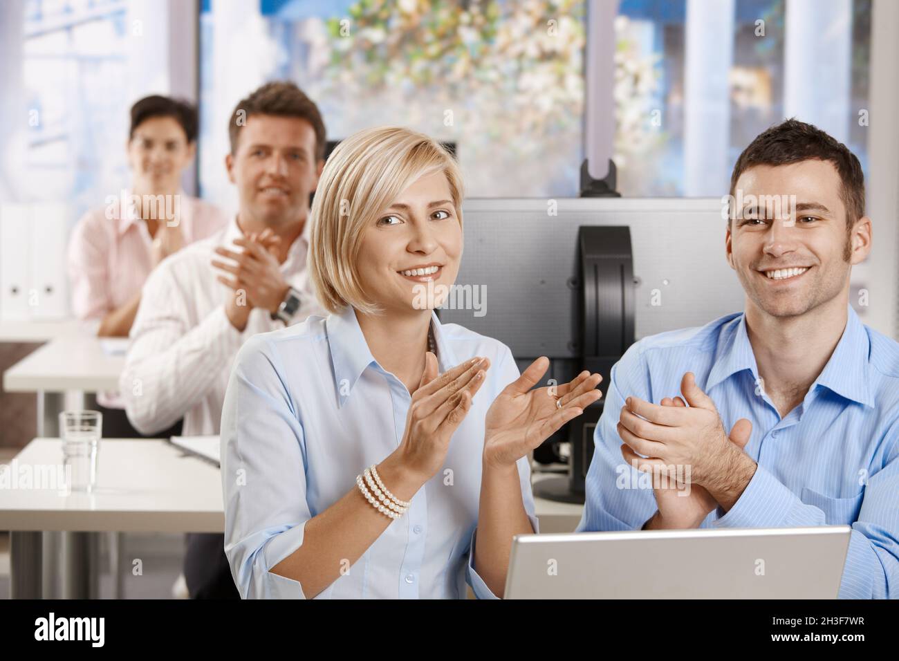 Business people clapping on training Stock Photo - Alamy