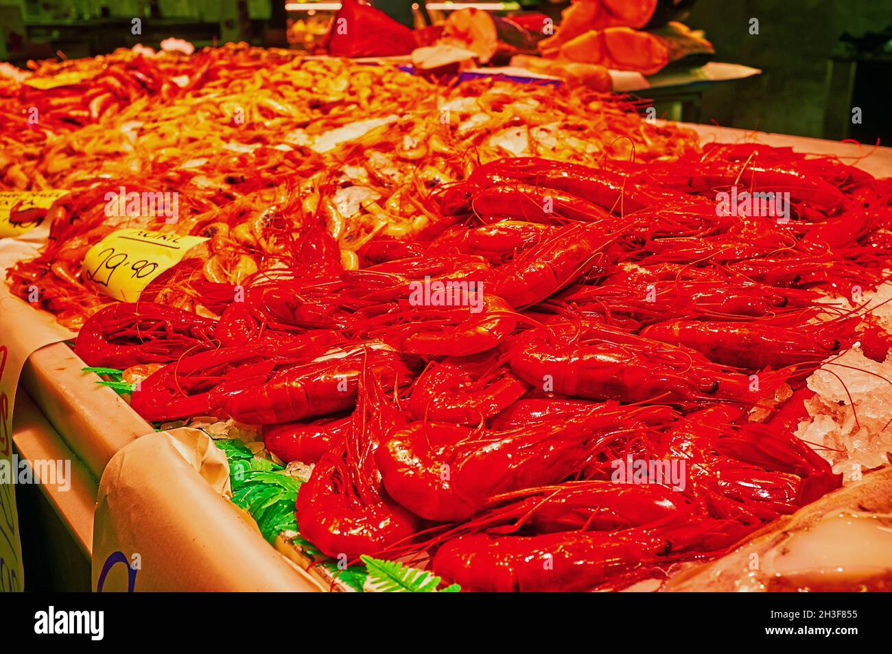 The fresh red prawns on ice in one of the stores of Mercado San Agustin ...