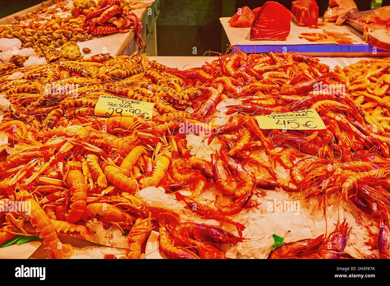 The red and tiger prawns, displayed in stall of Mercado San Agustin ...