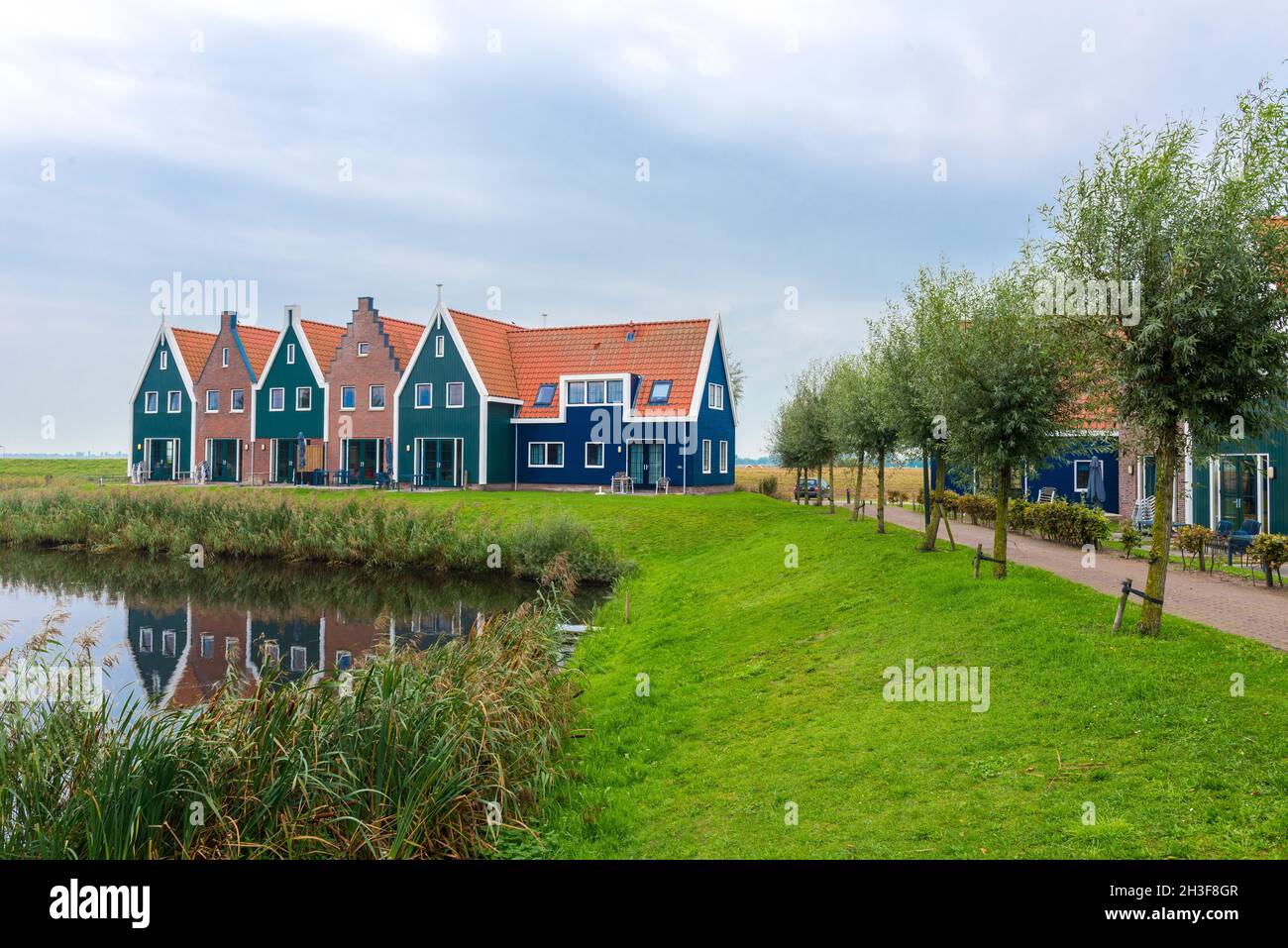 Volendam is a town in North Holland in the Netherlands. Colored houses ...