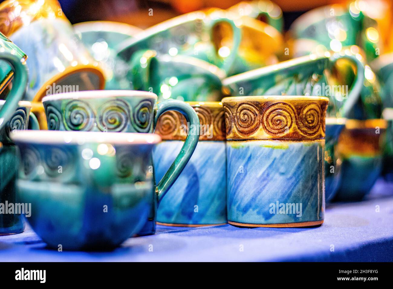 Closeup shot of creative painted ceramic cups Stock Photo - Alamy