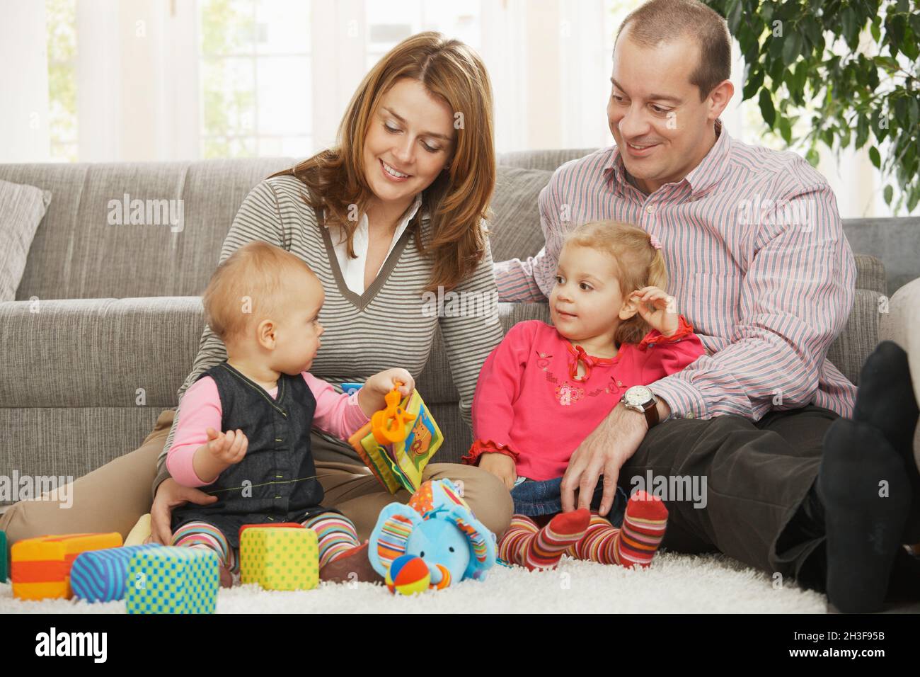 Smiling family portrait Stock Photo - Alamy