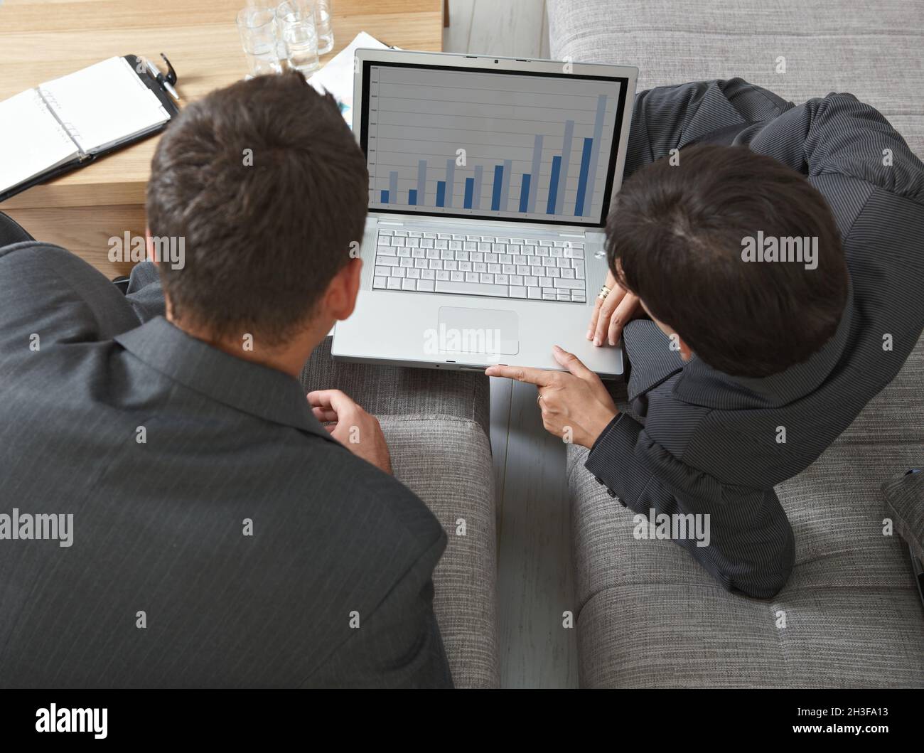 Business people with laptop Stock Photo - Alamy