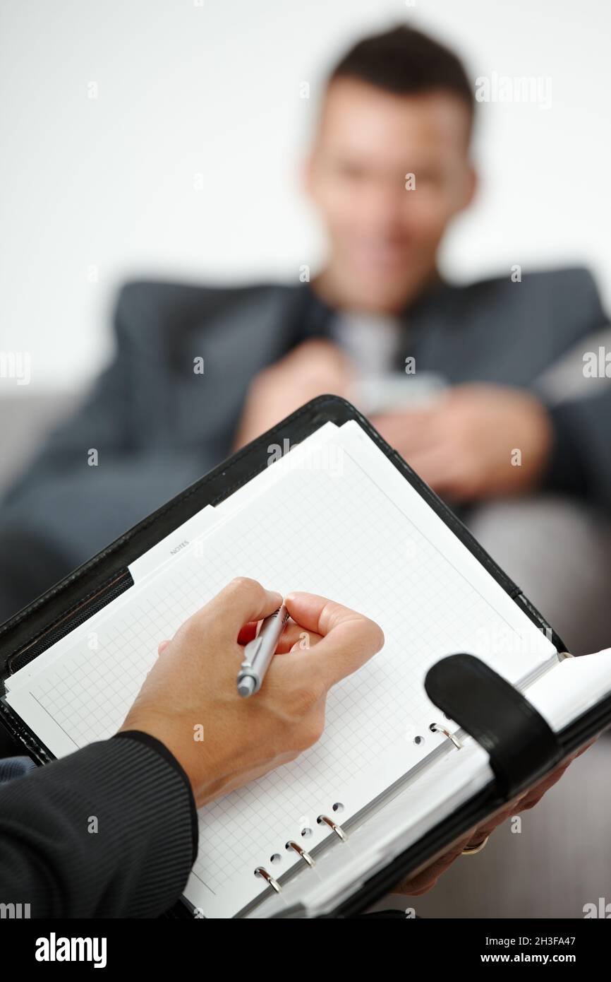 Hand writing notes Stock Photo - Alamy