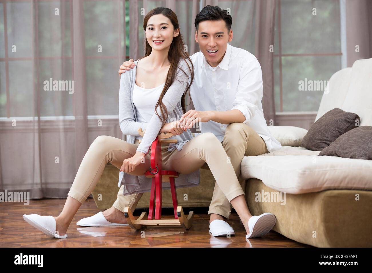 Stay-at-home young and loving couple Stock Photo - Alamy