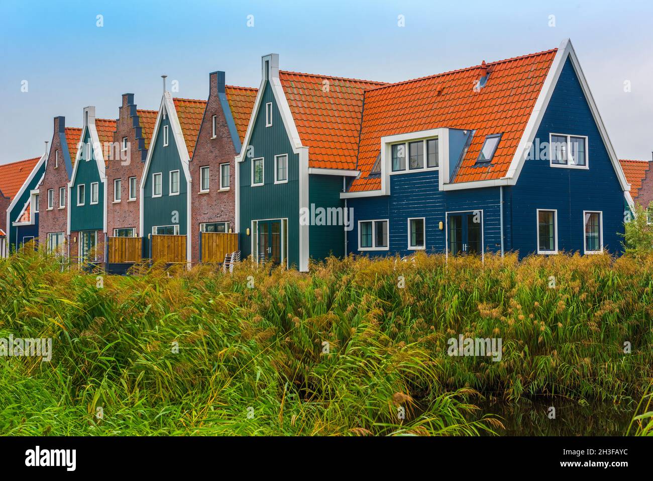 Volendam is a town in North Holland in the Netherlands. Colored houses ...