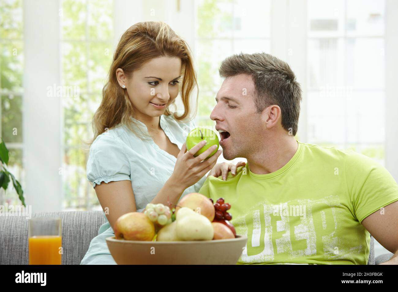 Cpople eating fruits Stock Photo - Alamy