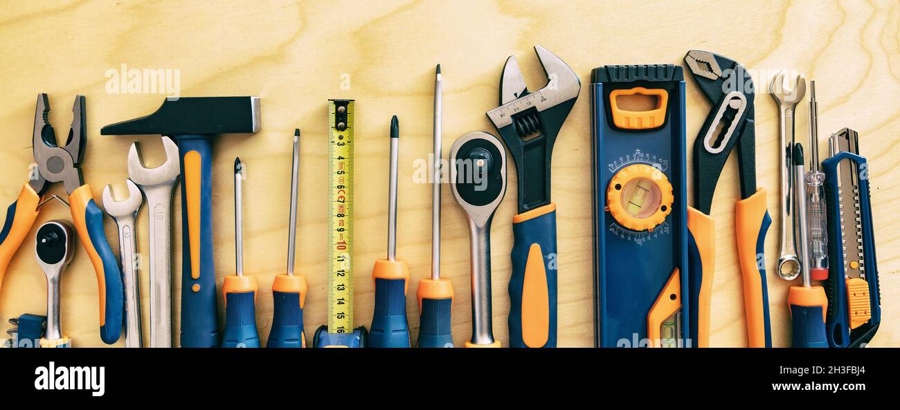 Workshop bench top view. Home repair tools set on wooden background ...