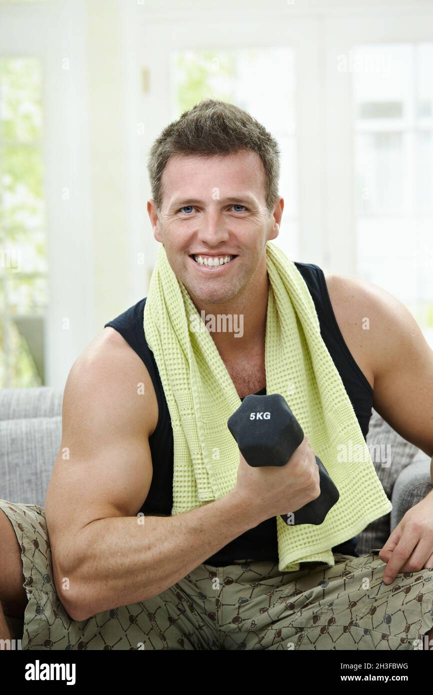 Biceps people man interior hi-res stock photography and images - Alamy