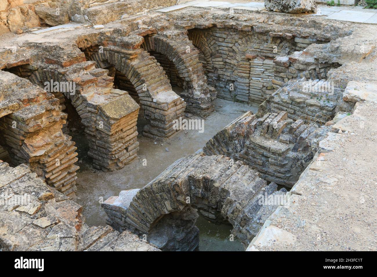 The caldarium or heated room in the Roman bath buildings at the ancient ...
