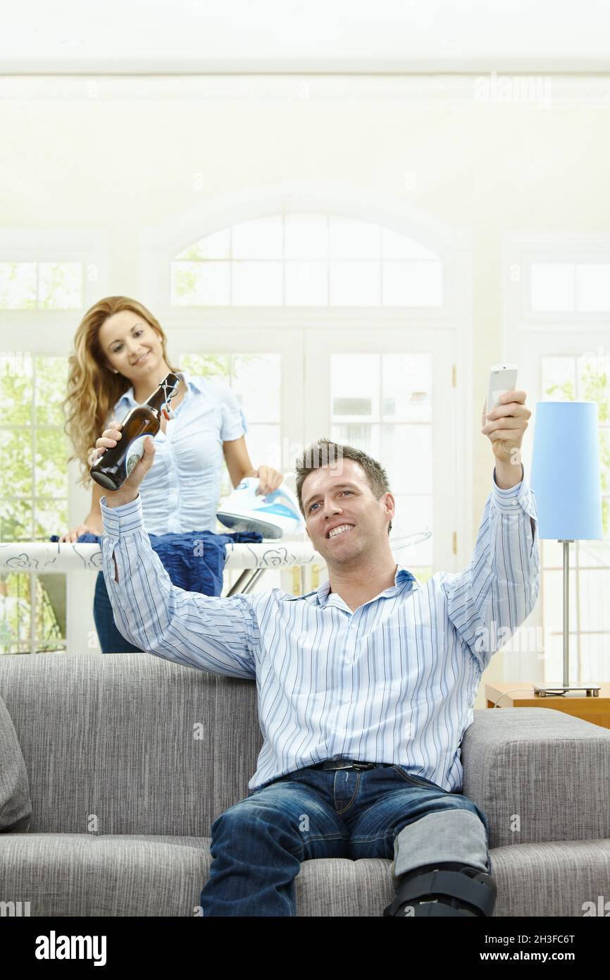 Excited man watching TV Stock Photo - Alamy