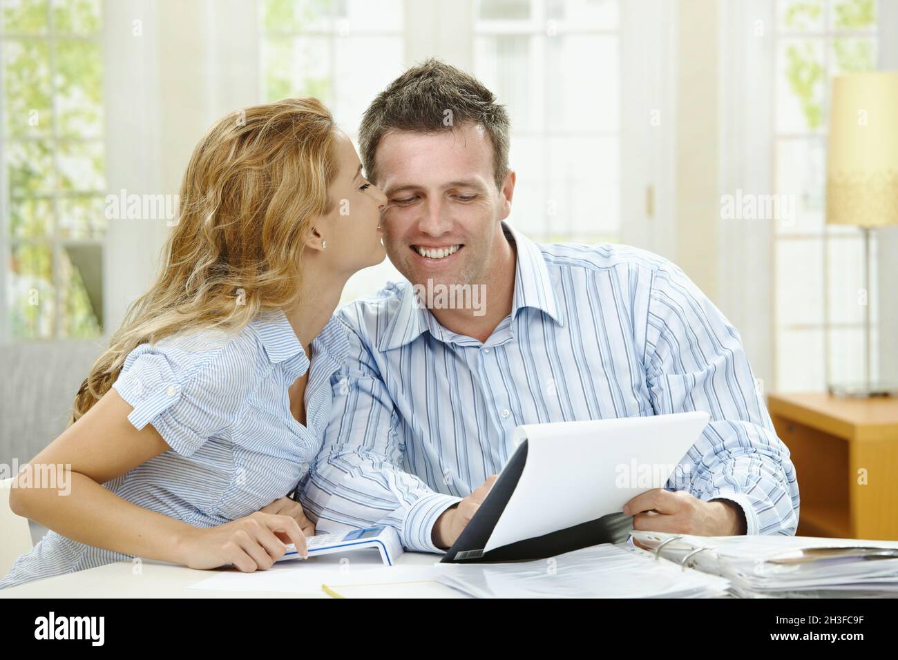 Cuople planning at home Stock Photo - Alamy