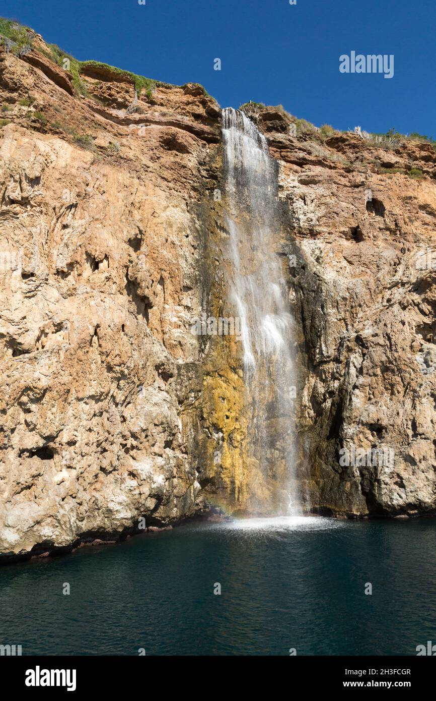 A small waterfall drops into the Mediterranean Sea on the Antalya ...