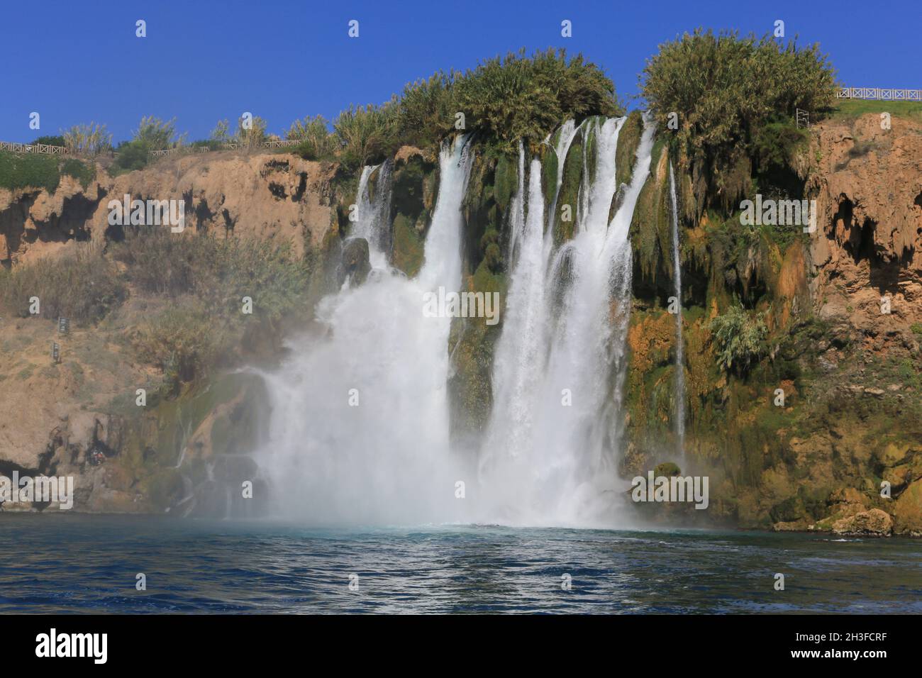 The beautiful Düden Waterfalls cascade into the Mediterranean Sea along ...