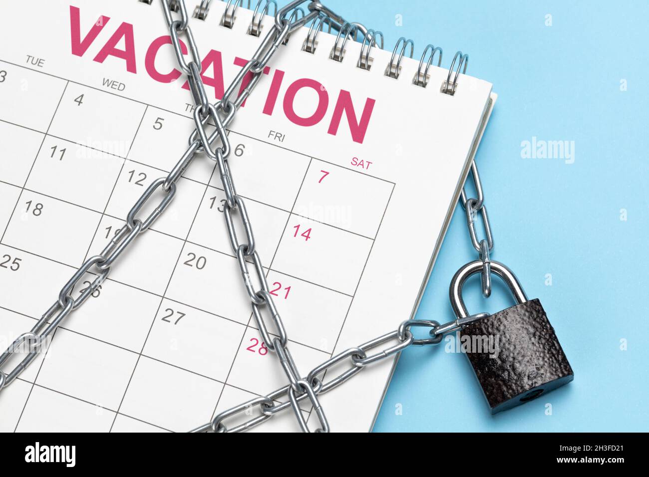 Calendar with chain and lock. Banned vacation, quarantine restrictions ...