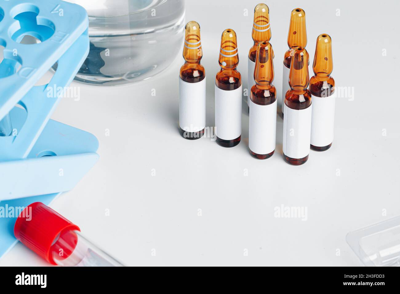 Glass medical ampoule bottles vial for injection Stock Photo - Alamy