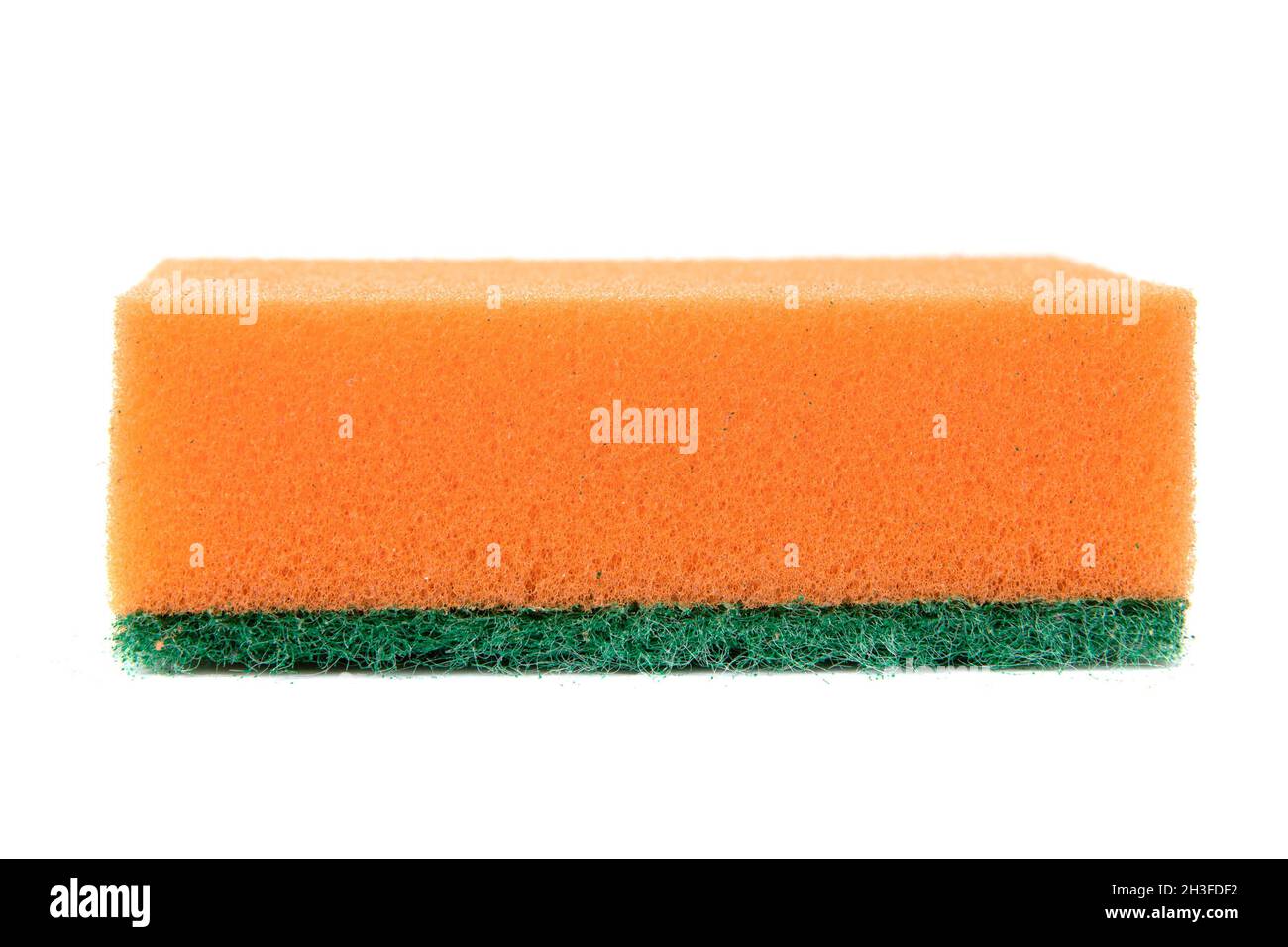 orange dishwashing sponge on white isolated background, close-up Stock ...