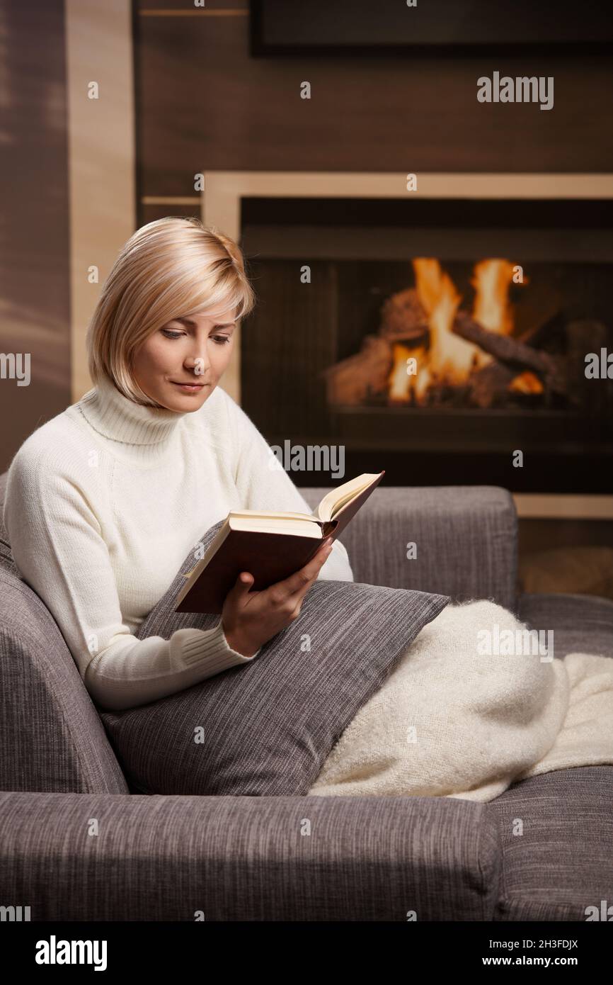Woman reading at home Stock Photo - Alamy