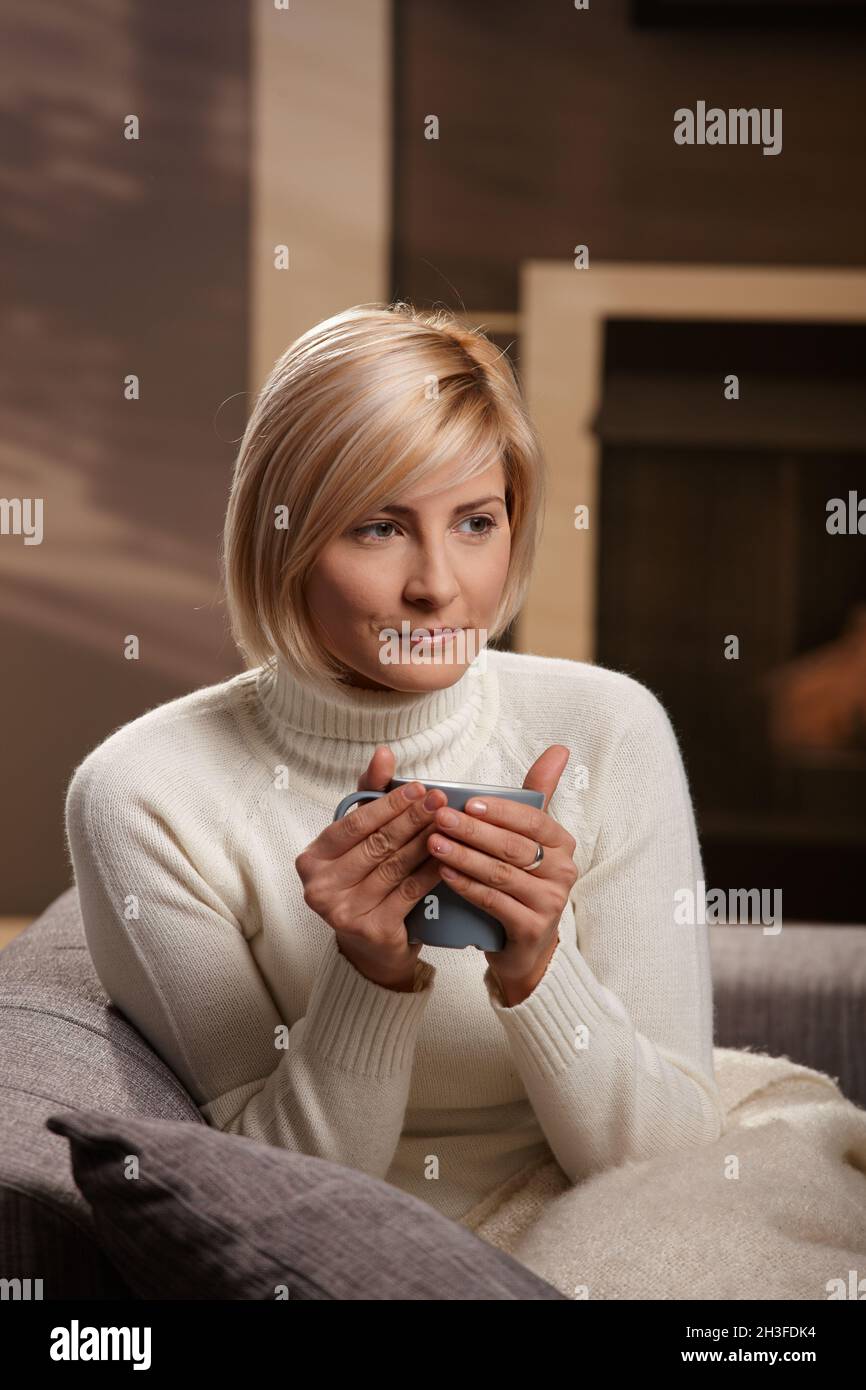 Woman at home Stock Photo - Alamy
