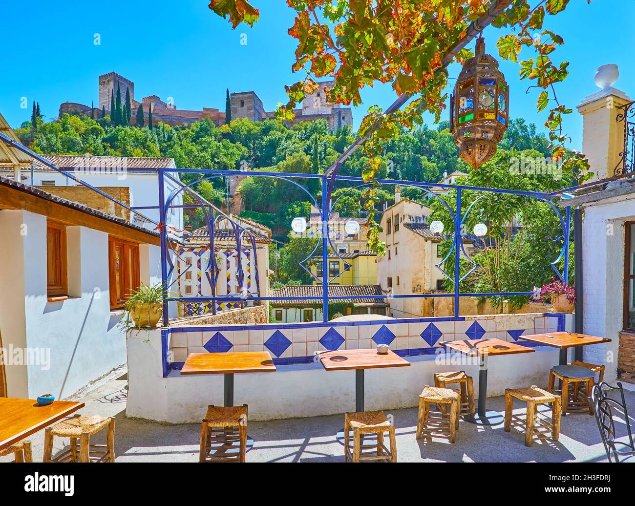 The medieval fortress of Alhambra from the scenic outdoor terrace of ...