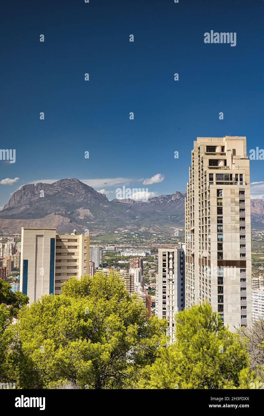 A view of a fragment of the city of Benidorm and the mountains, on the ...