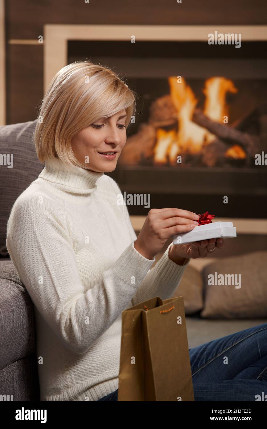 Woman wrapping presents Stock Photo - Alamy