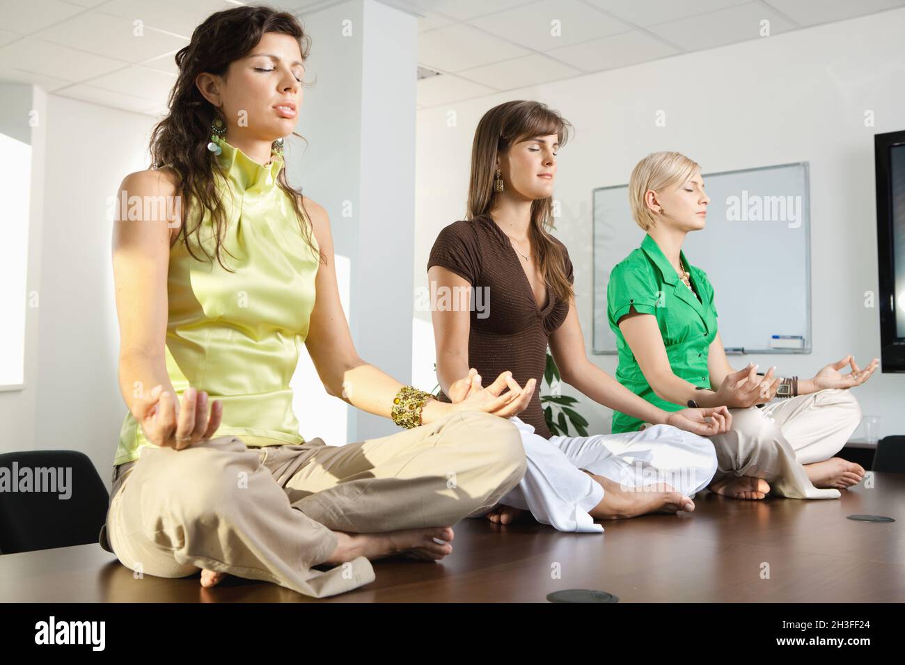 Seated lotus position hi-res stock photography and images - Alamy