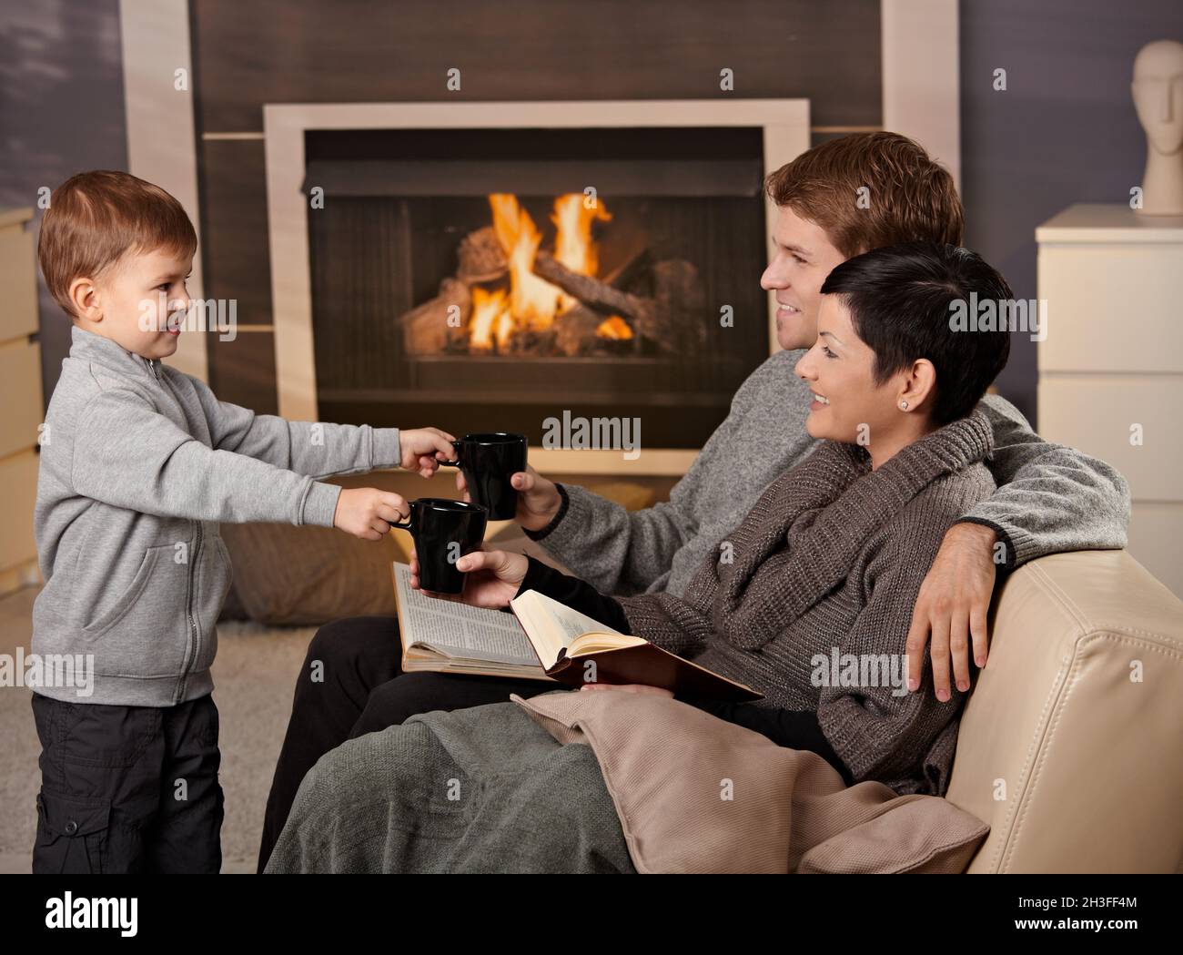 Happy family at home Stock Photo - Alamy
