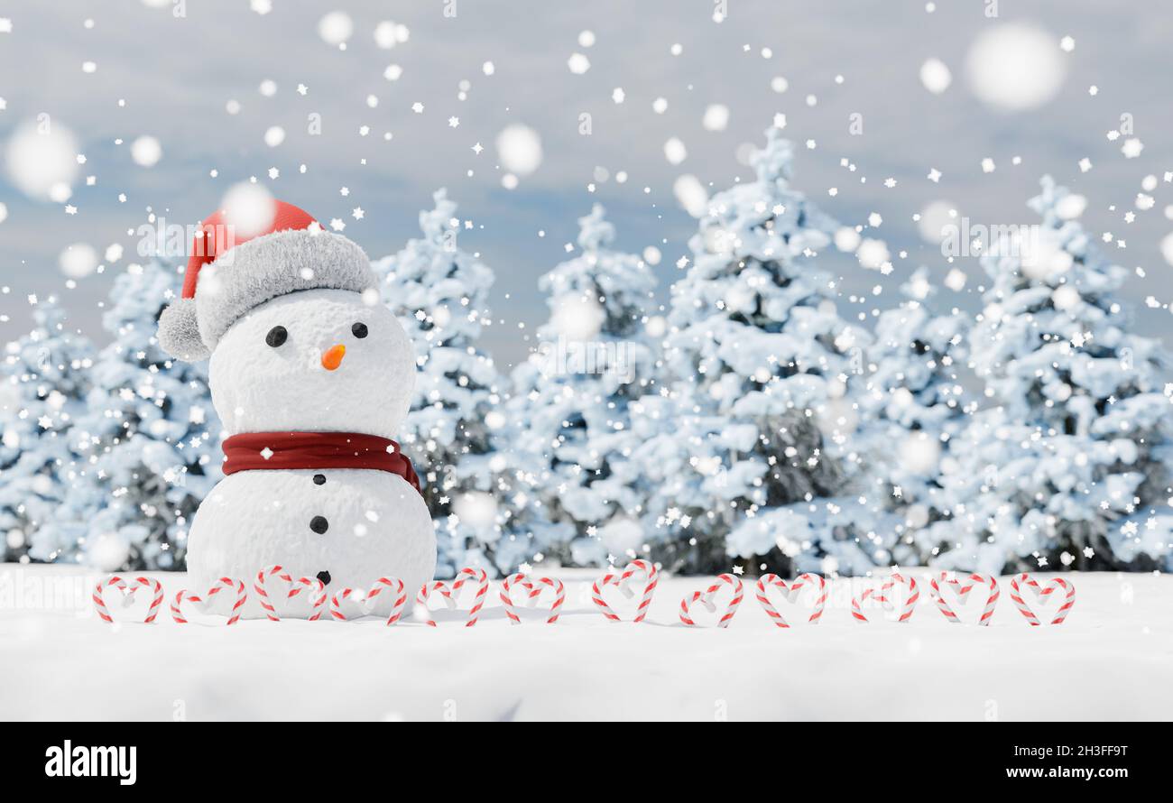 snowman with christmas candy canes in a snowy landscape with blurred ...