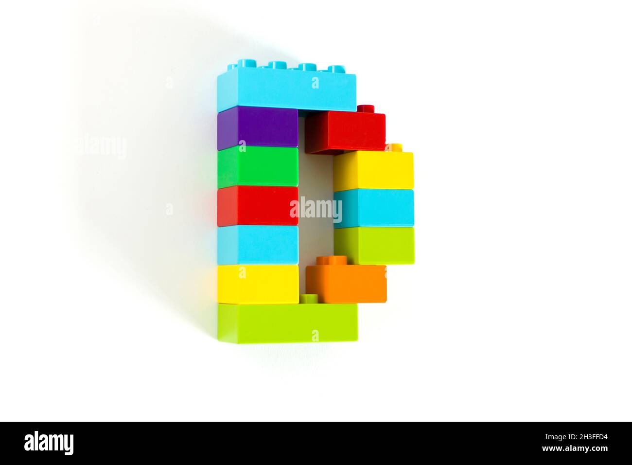 Colorful toy brick letter D isolated on the white background Stock ...